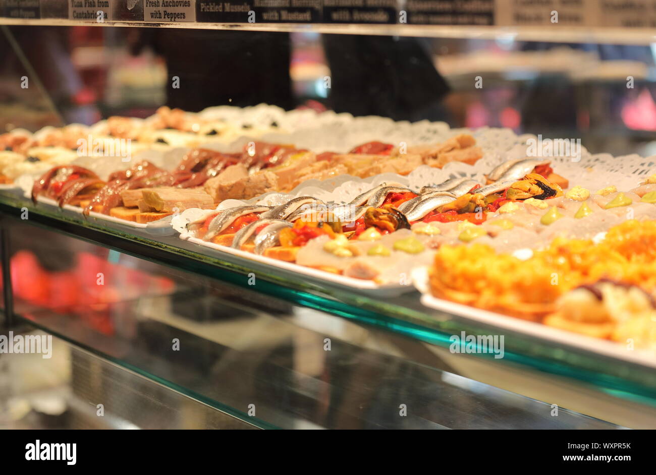 Spanish food restaurant tapas display Stock Photo - Alamy