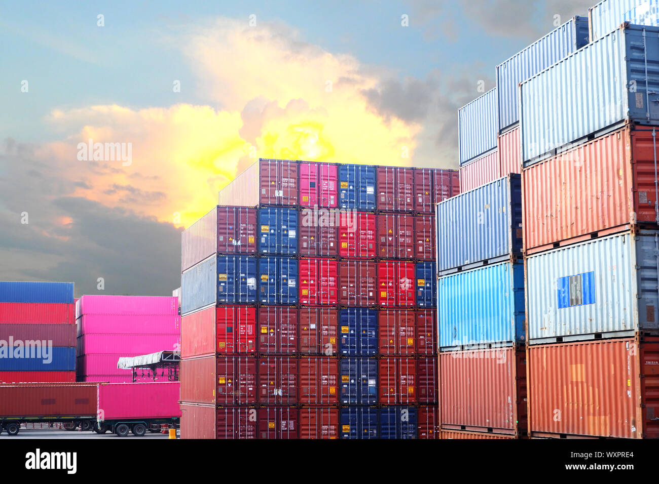 Container stack during sunset Working concept in the port Stock Photo ...