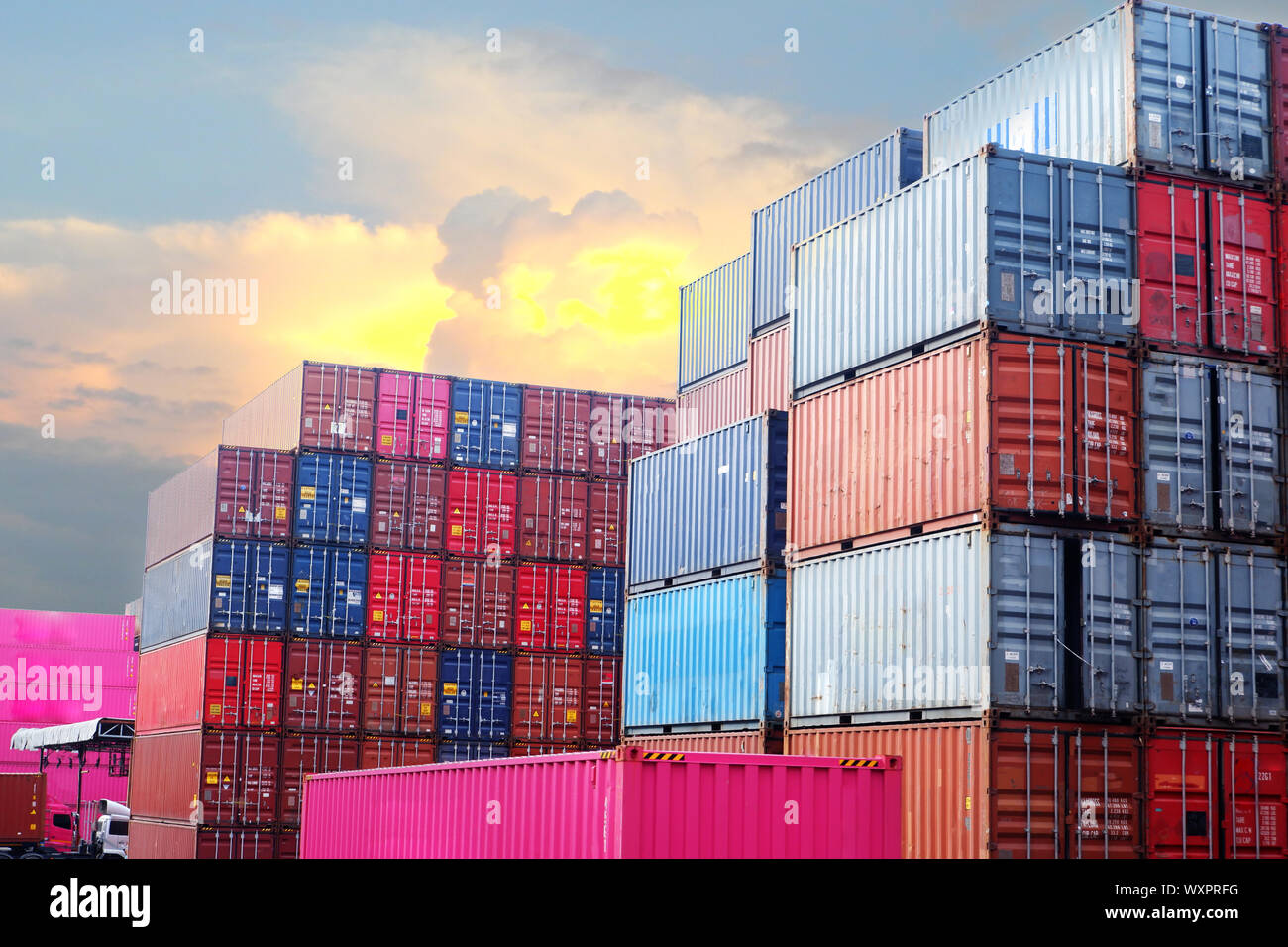 Container stack during sunset Working concept in the port Stock Photo ...