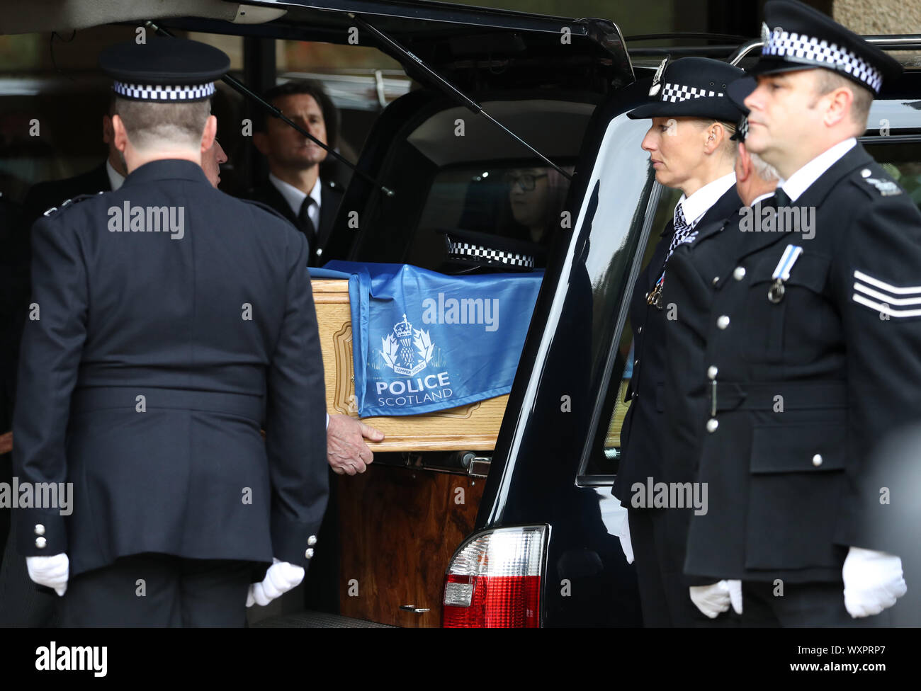 Police officers other emergency services form guard of honour hi-res ...