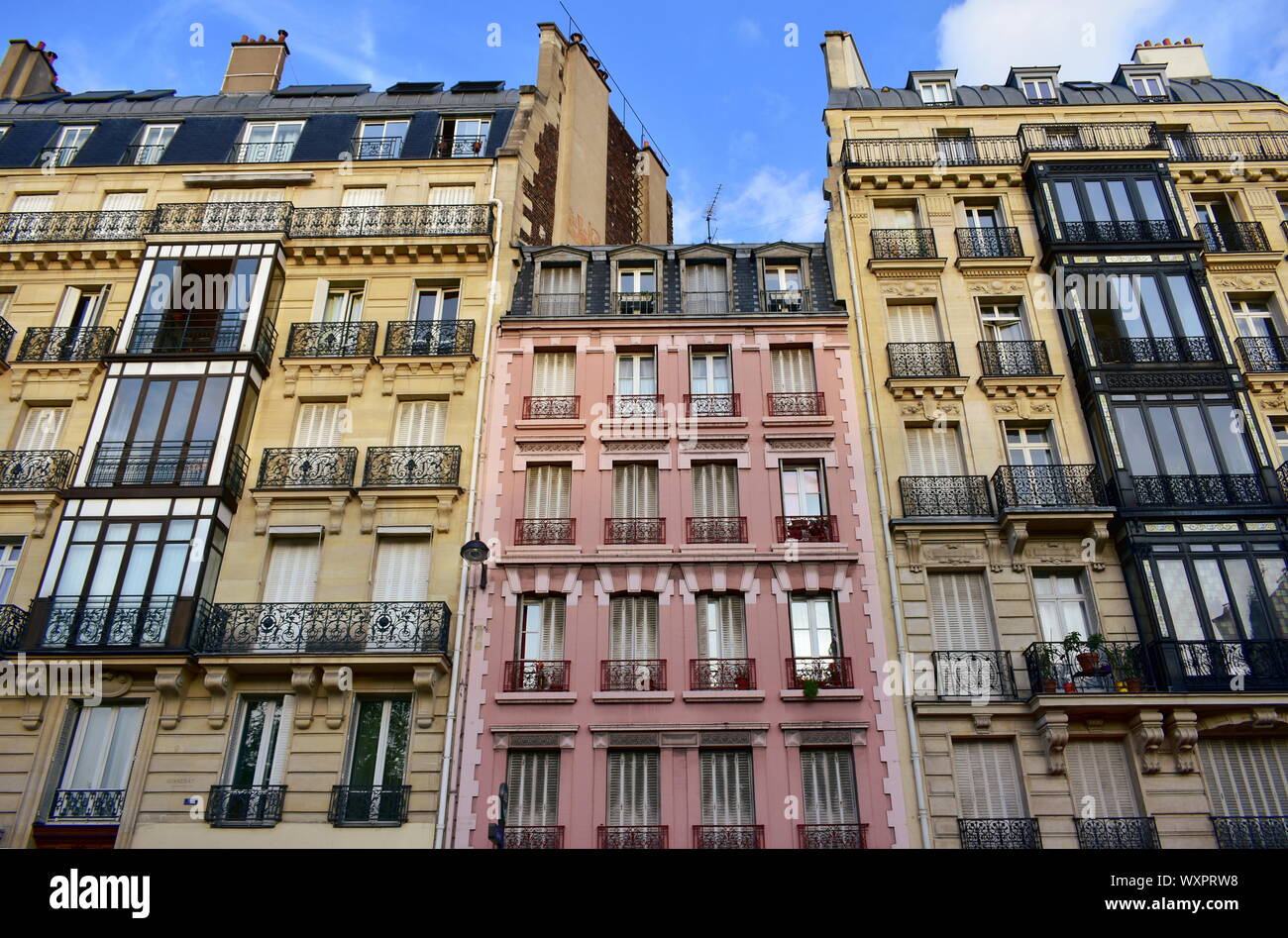 Yellow and pink buildings at the Latin Quarter. Paris, France. August ...