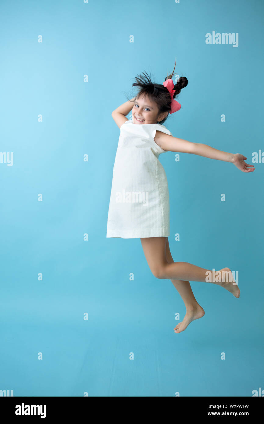 Happy Kid Jumping High Stock Photo - Alamy