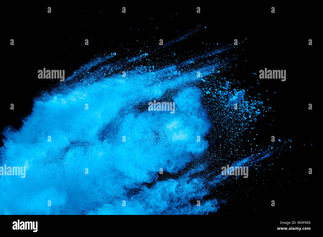 Blue powder explode cloud on black background. Launched blue dust ...