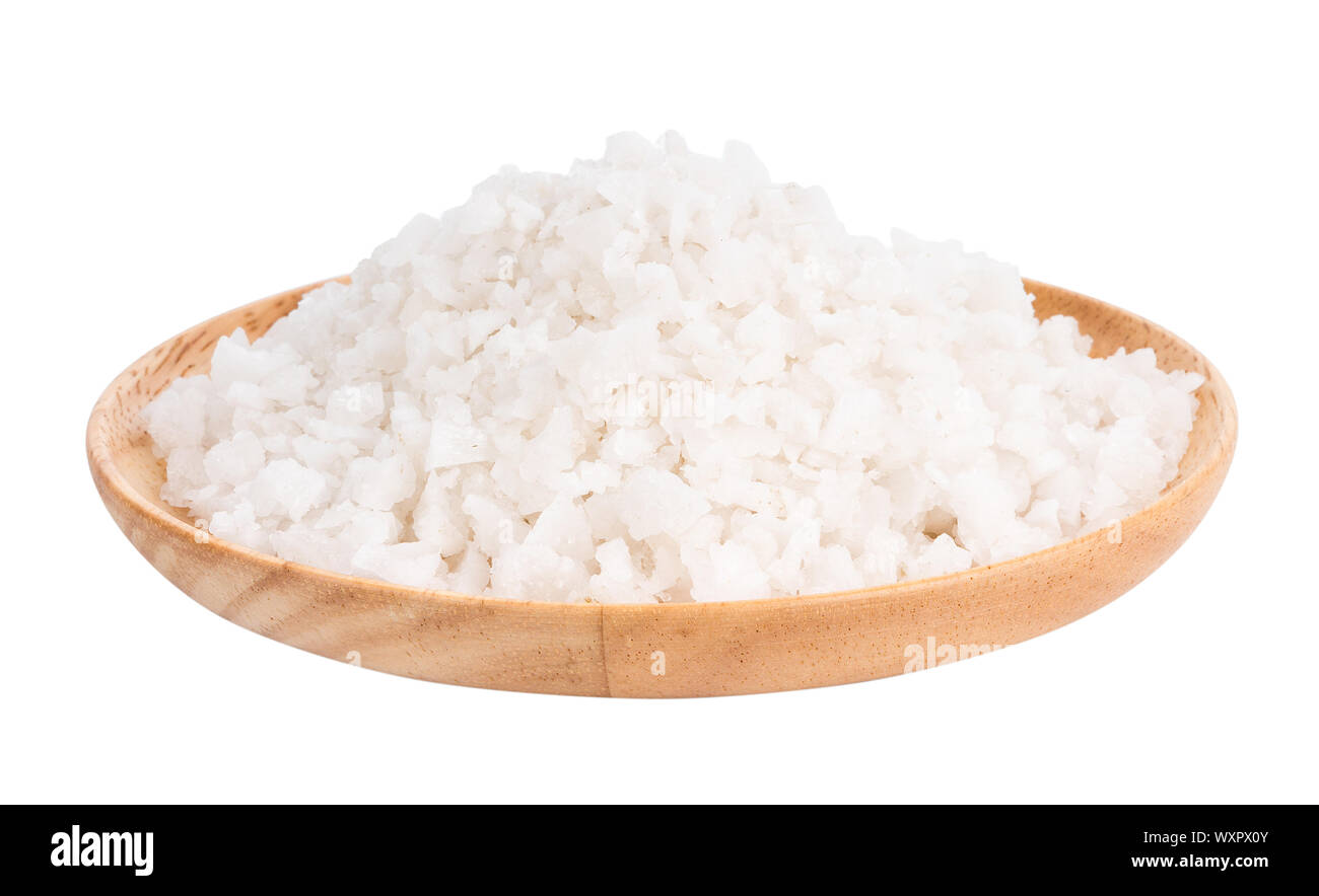 Sea salt in wooden plate on white background Stock Photo - Alamy