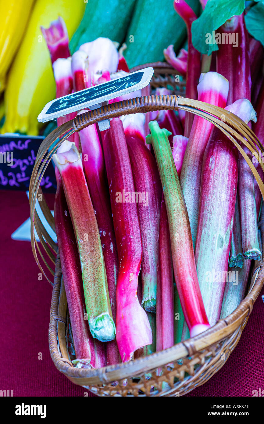 Fresh Rhubarb in Basket in a Vegetable Market Stock Photo - Alamy