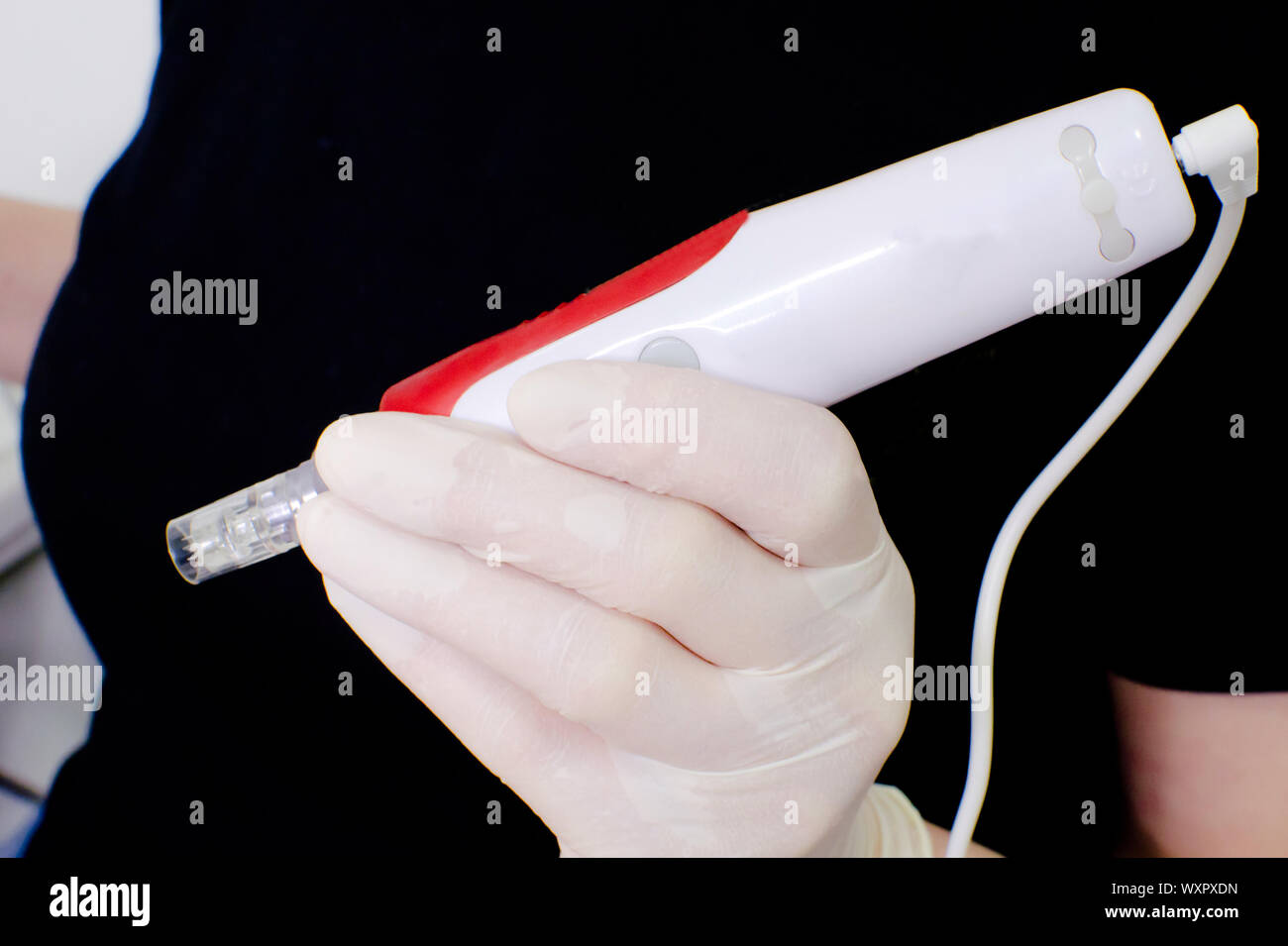 beautician in white gloves holding dermis stamp electric pen,dermapen ...