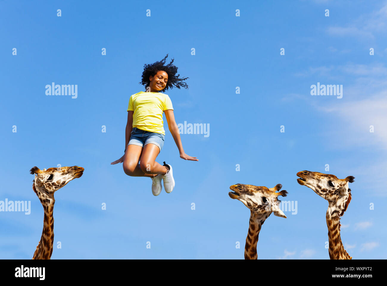 Over their heads hi-res stock photography and images - Alamy
