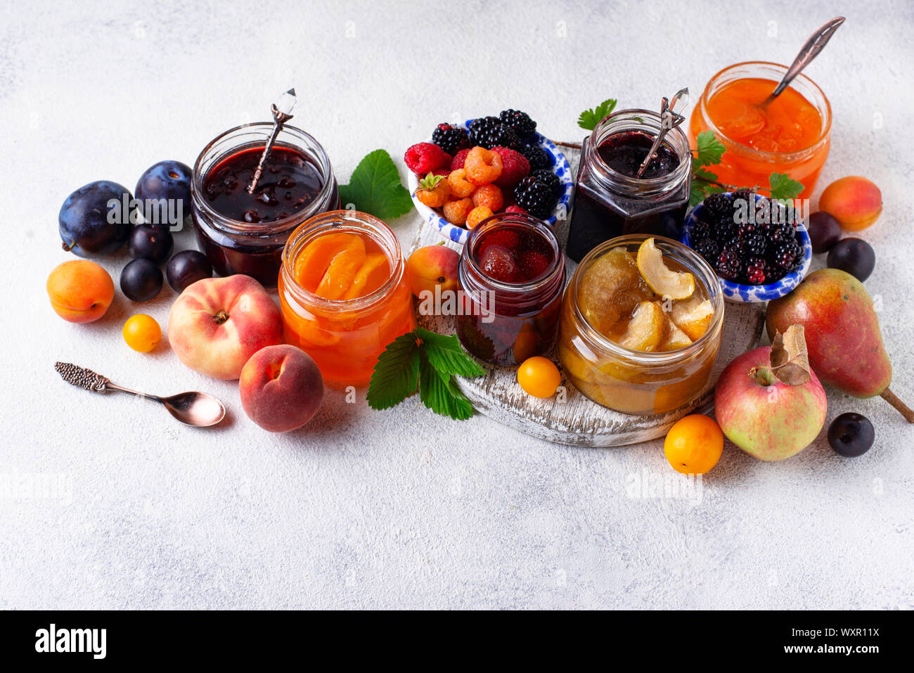 Assortment of different jams in jars Stock Photo - Alamy