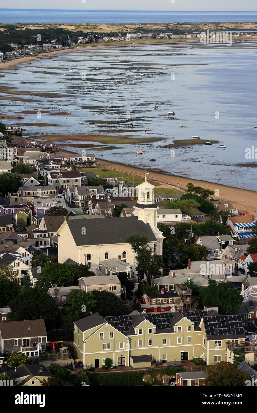 Aerial view of Provincetown and it;s beach coastline with tower of ...