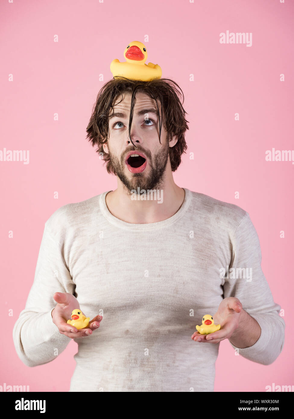 Morning washing, wake up, everyday life. Man splash water at face on ...