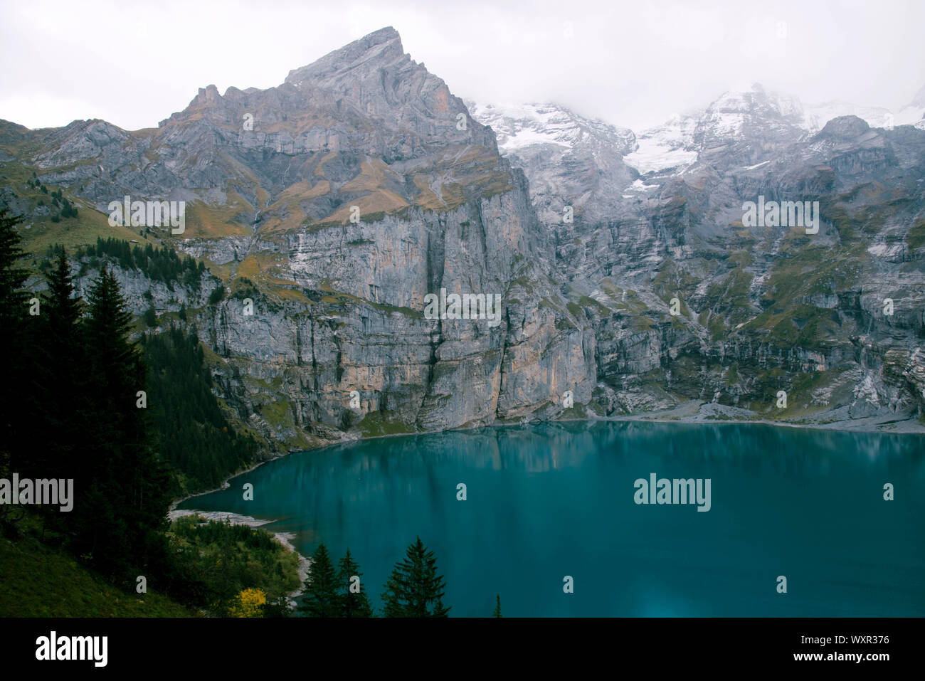 View of Oeschinen Lake in the Swiss alps with beautiful turquoise water ...
