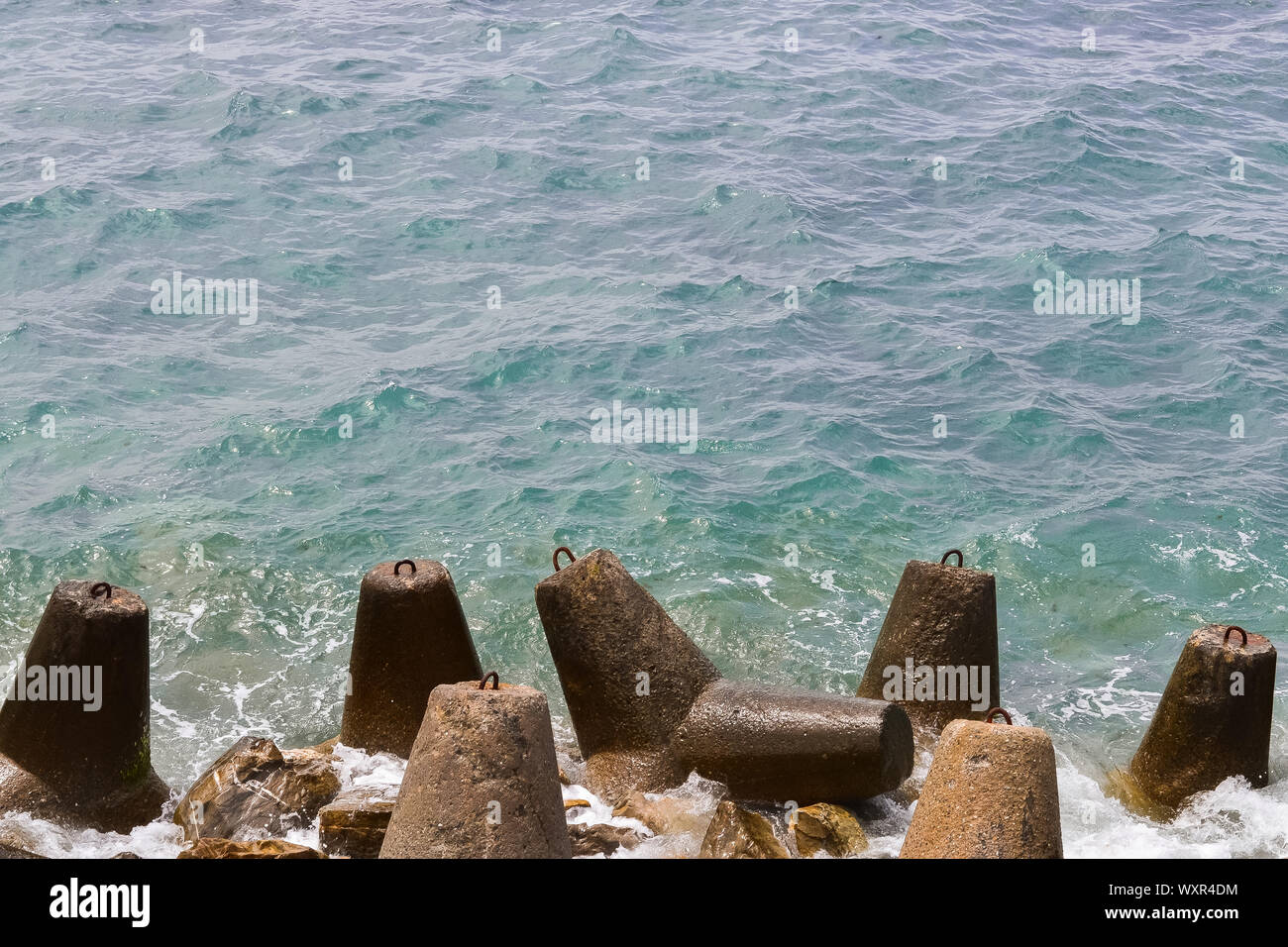 breakwaters are in the sea. Breakwaters cut the waves in the ocean ...
