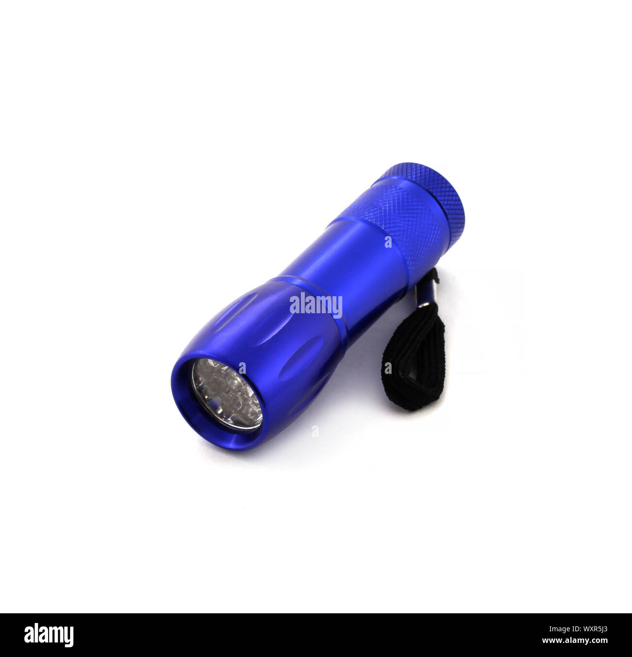 Small metal led flashlight in blue color on white background Stock ...