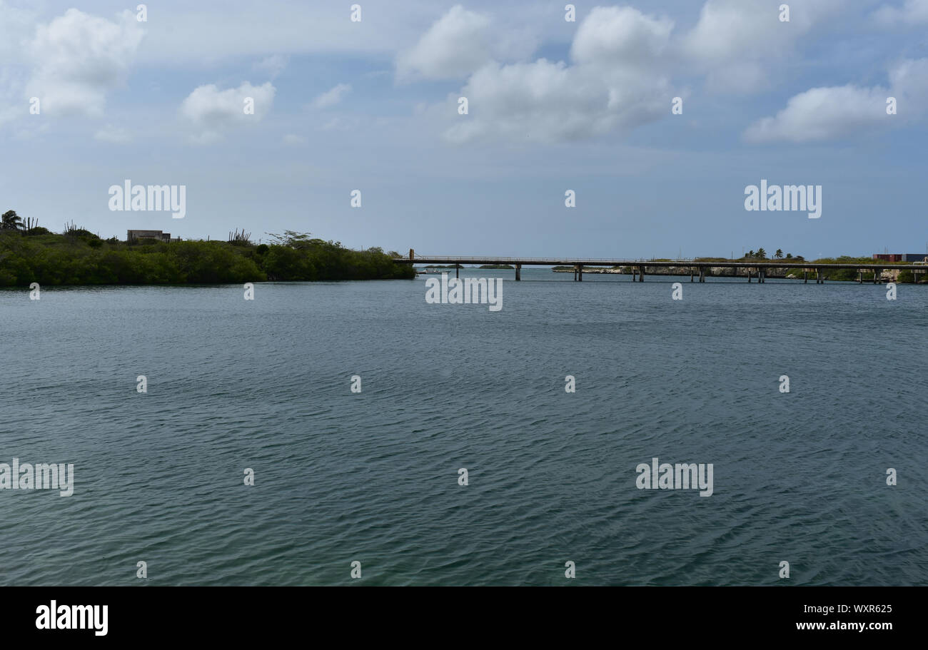 Bridge extended over the tidal flow of the Spanish Lagoon in Aruba ...