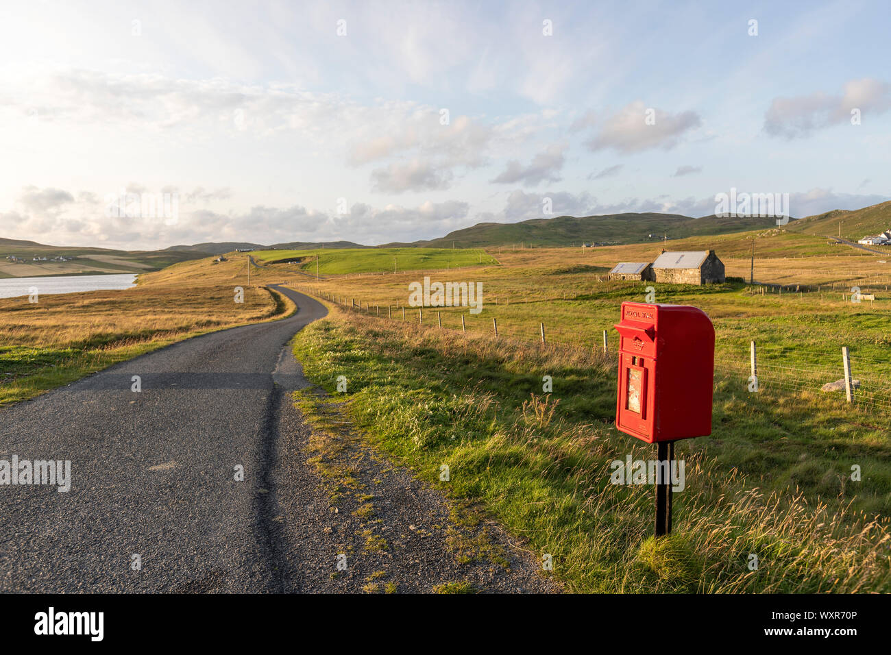 Isolated red mail box in North Roe, Mainland, Shetland islands ...