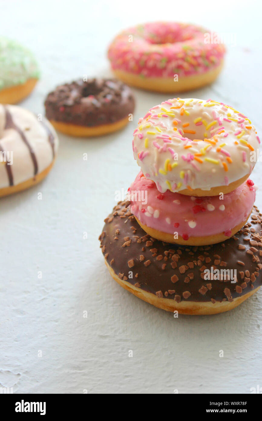 Assorted colorful donuts close-up. Photos of different donuts Stock ...