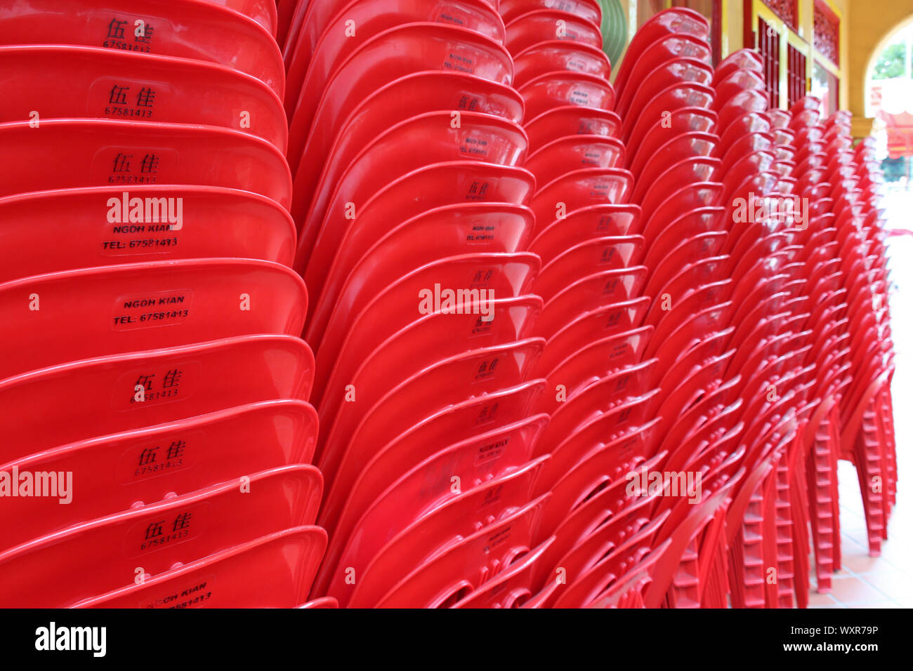 chairs in a chinese temple in singapore Stock Photo - Alamy