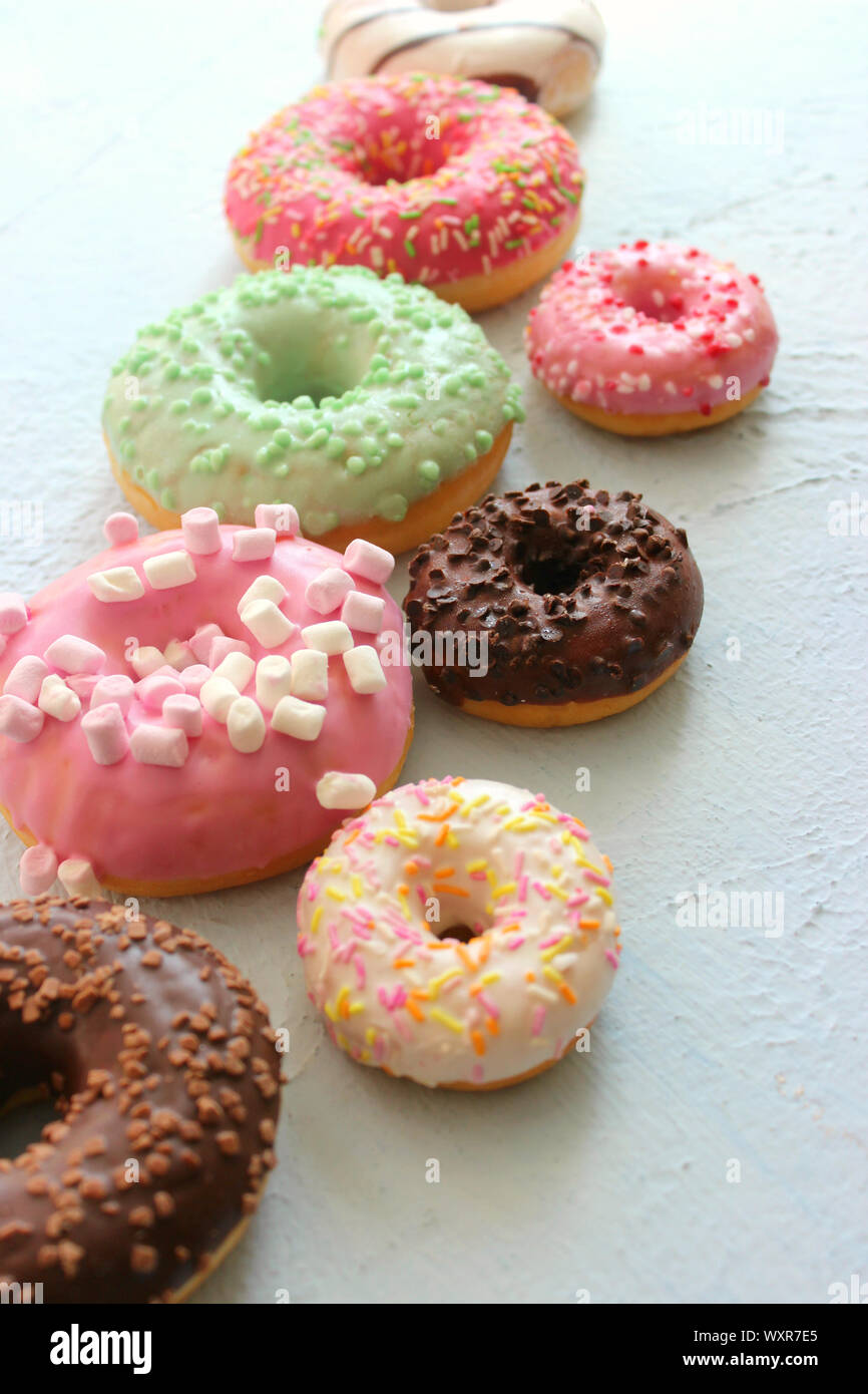 Assorted colorful donuts close-up. Photos of different donuts Stock ...