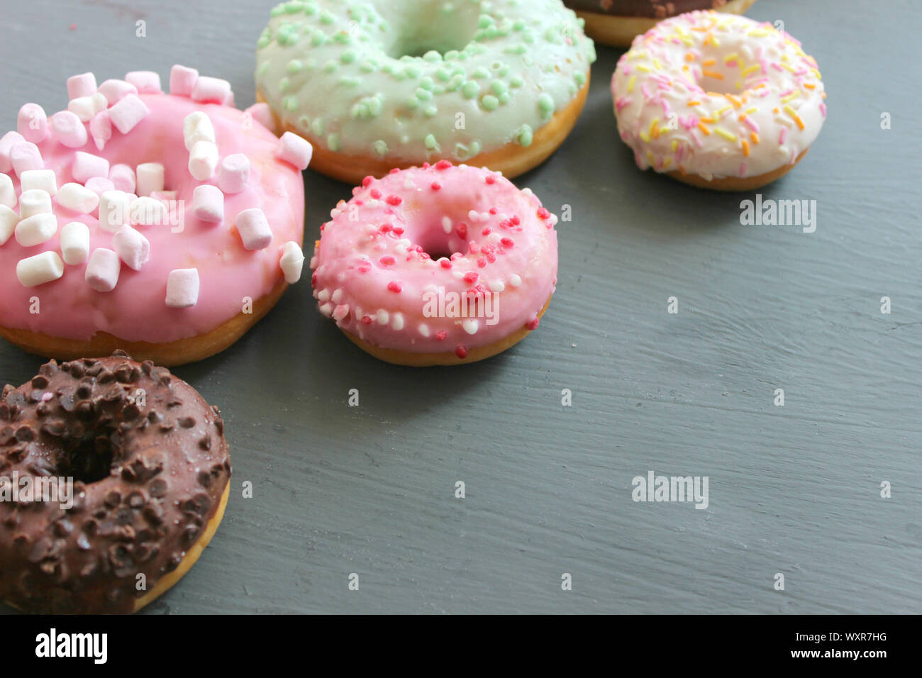 Assorted colorful donuts close-up. Photos of different donuts Stock ...
