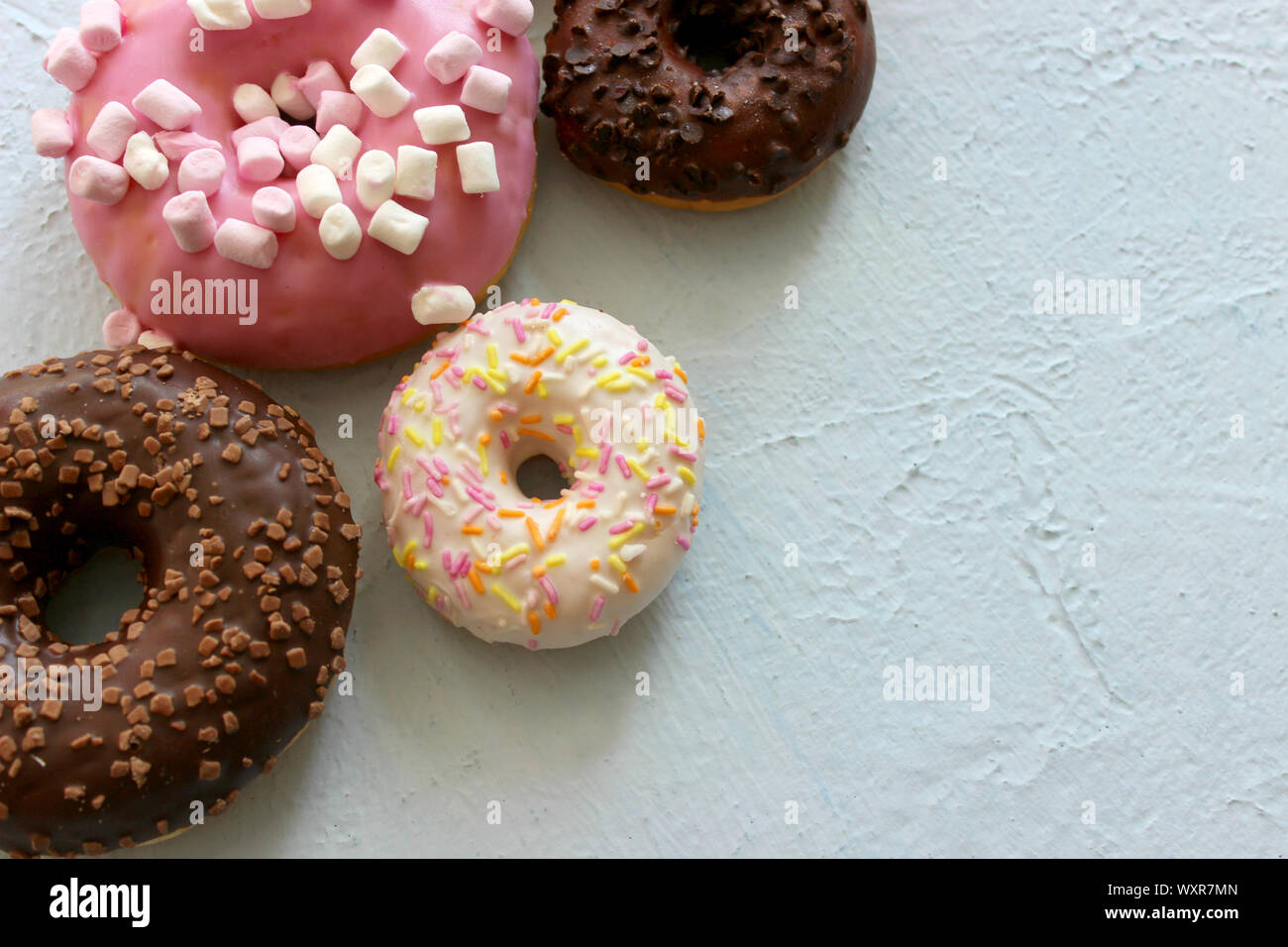 Assorted colorful donuts close-up. Photos of different donuts Stock ...