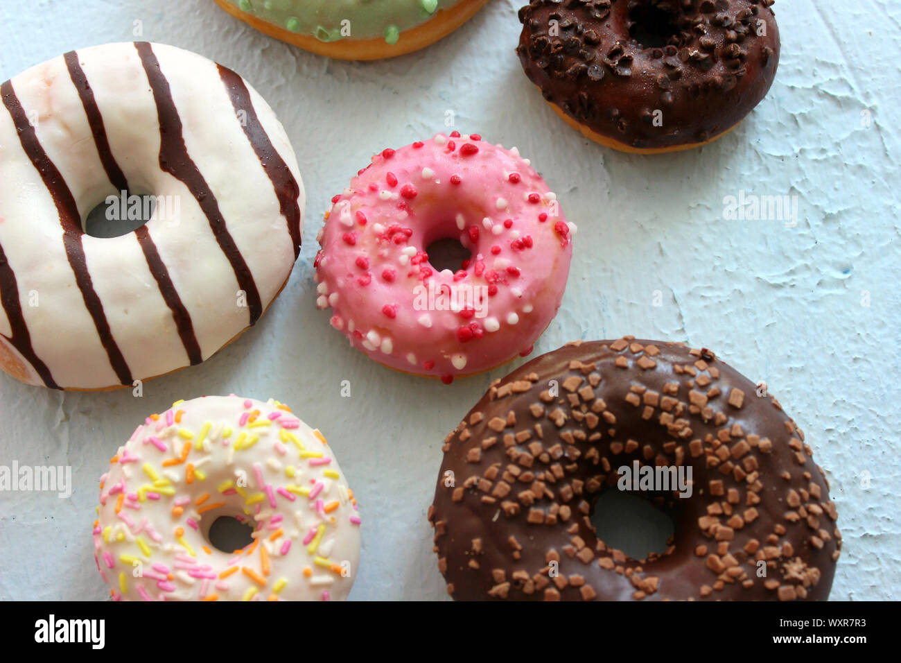 Assorted colorful donuts close-up. Photos of different donuts Stock ...