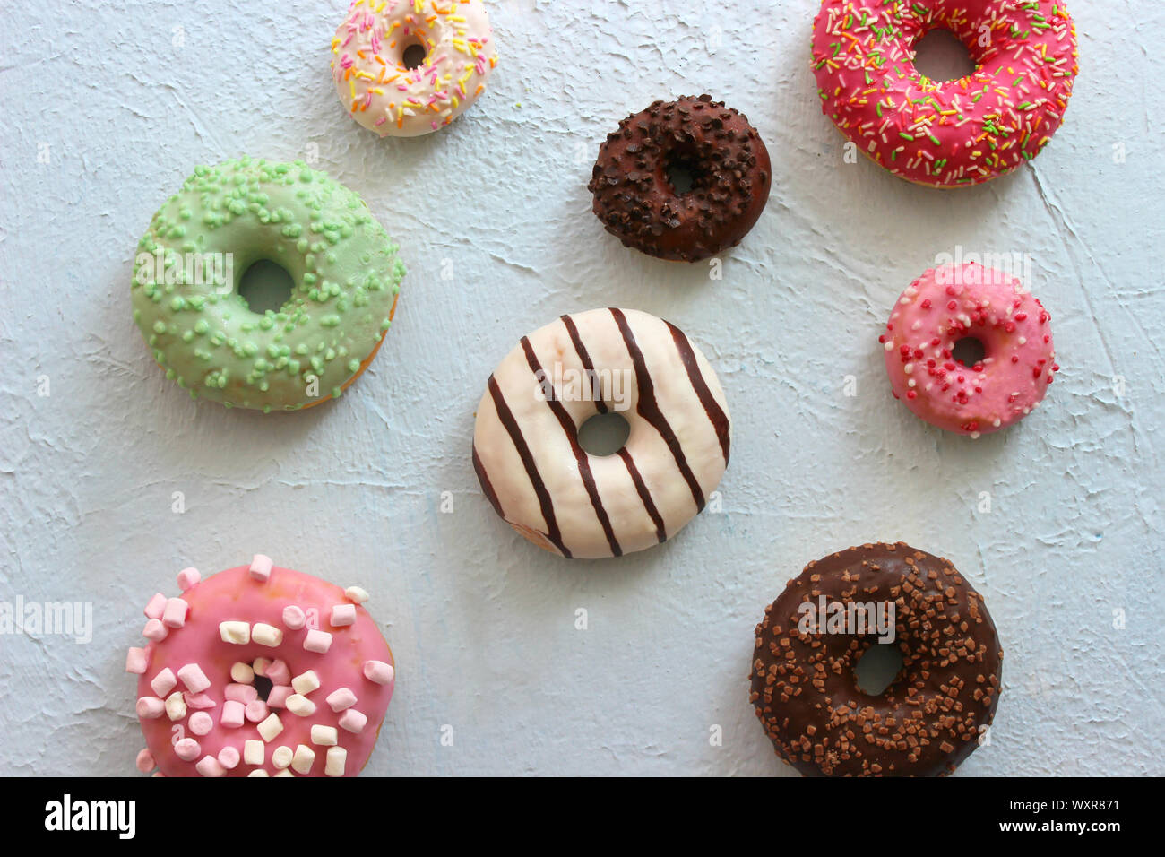 Assorted colorful donuts close-up. Photos of different donuts Stock ...