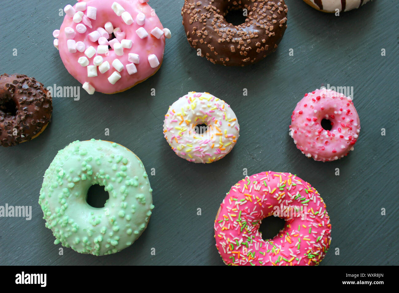Assorted colorful donuts close-up. Photos of different donuts Stock ...