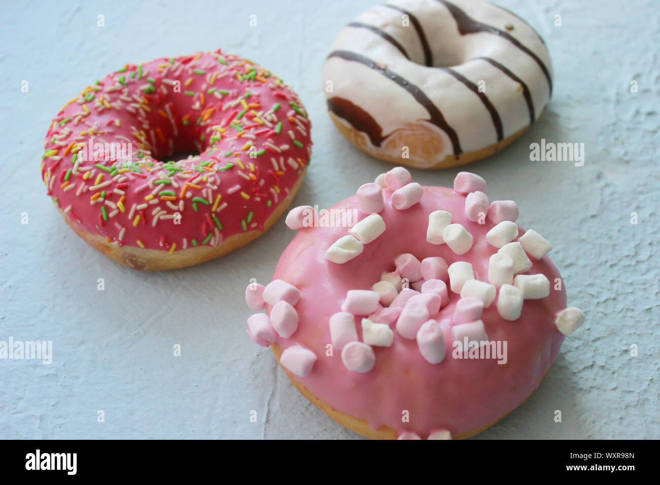Assorted colorful donuts close-up. Photos of different donuts Stock ...