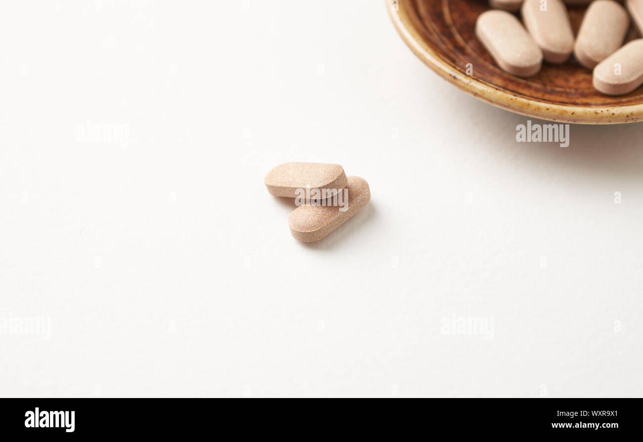 Rhodiola rosea. Golden root, rose root. Herbal pills with healthy ...