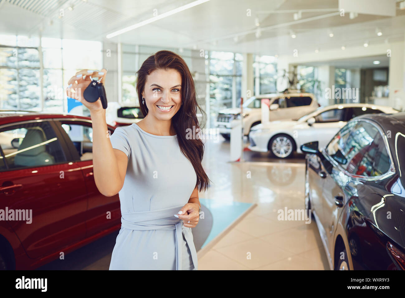 Female car sales woman hi-res stock photography and images - Alamy