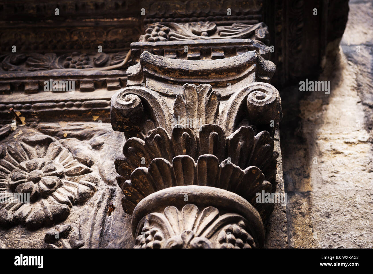 Ancient columns with Renaissance bas-reliefs and plants patterns in the ...