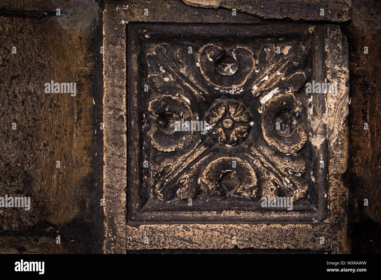 Ancient columns with Renaissance bas-reliefs and plants patterns in the ...