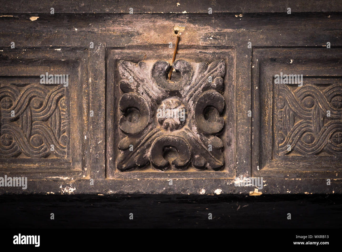 Ancient columns with Renaissance bas-reliefs and plants patterns in the ...