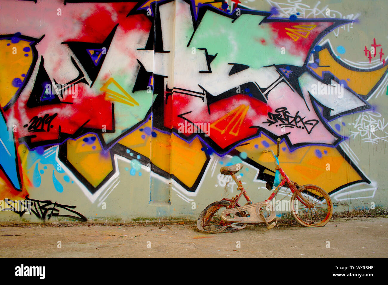 Wall of rusty wheels hi-res stock photography and images - Alamy