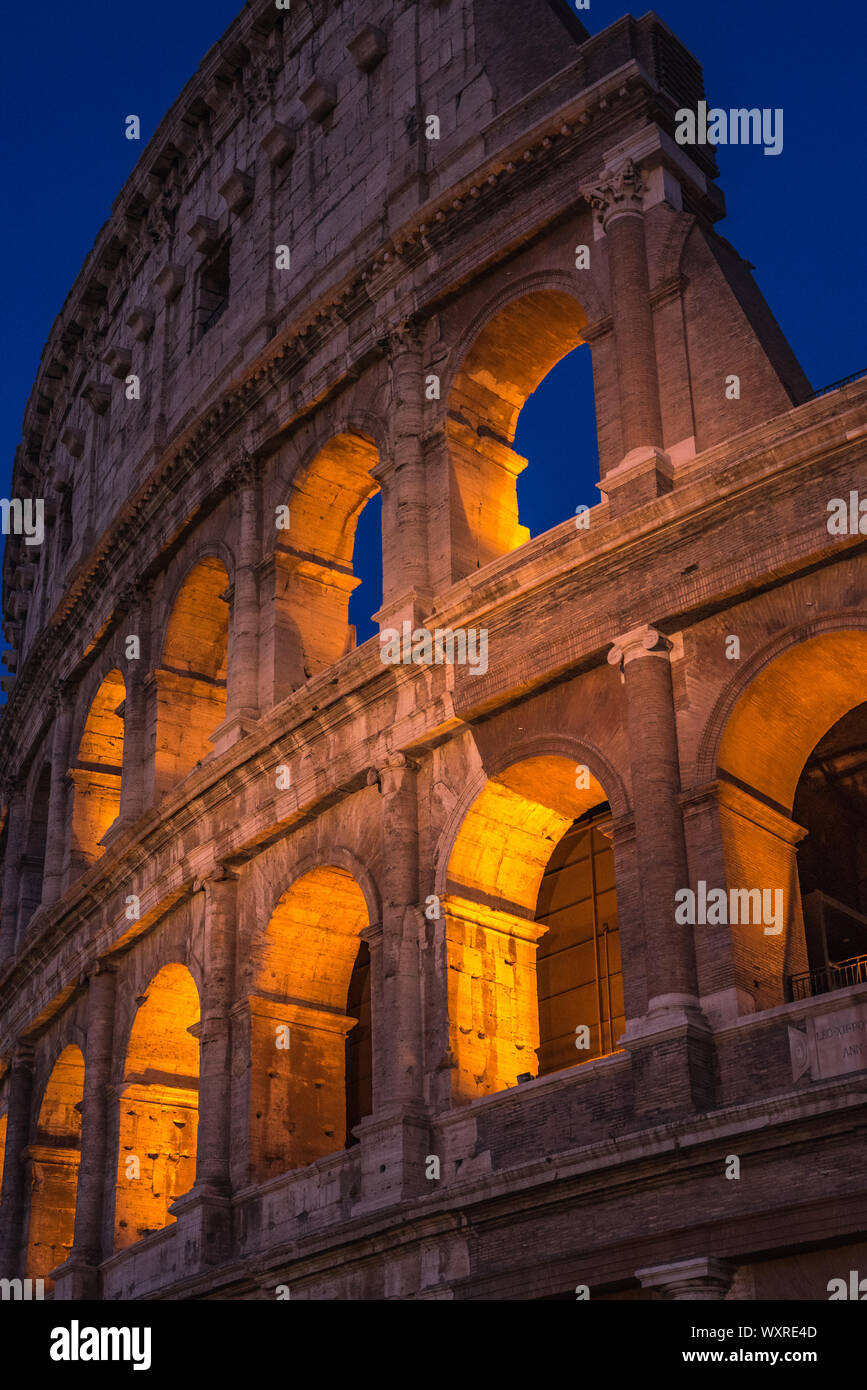 The Colosseum under the glow of lights at night, Rome Stock Photo - Alamy