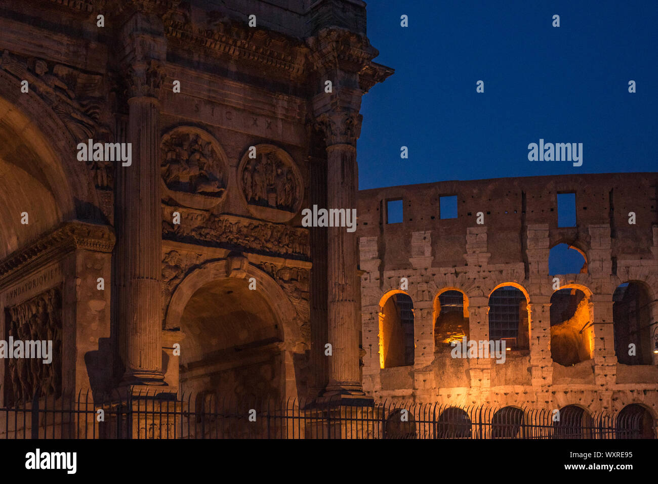 The Colosseum under the glow of lights at night, Rome Stock Photo - Alamy