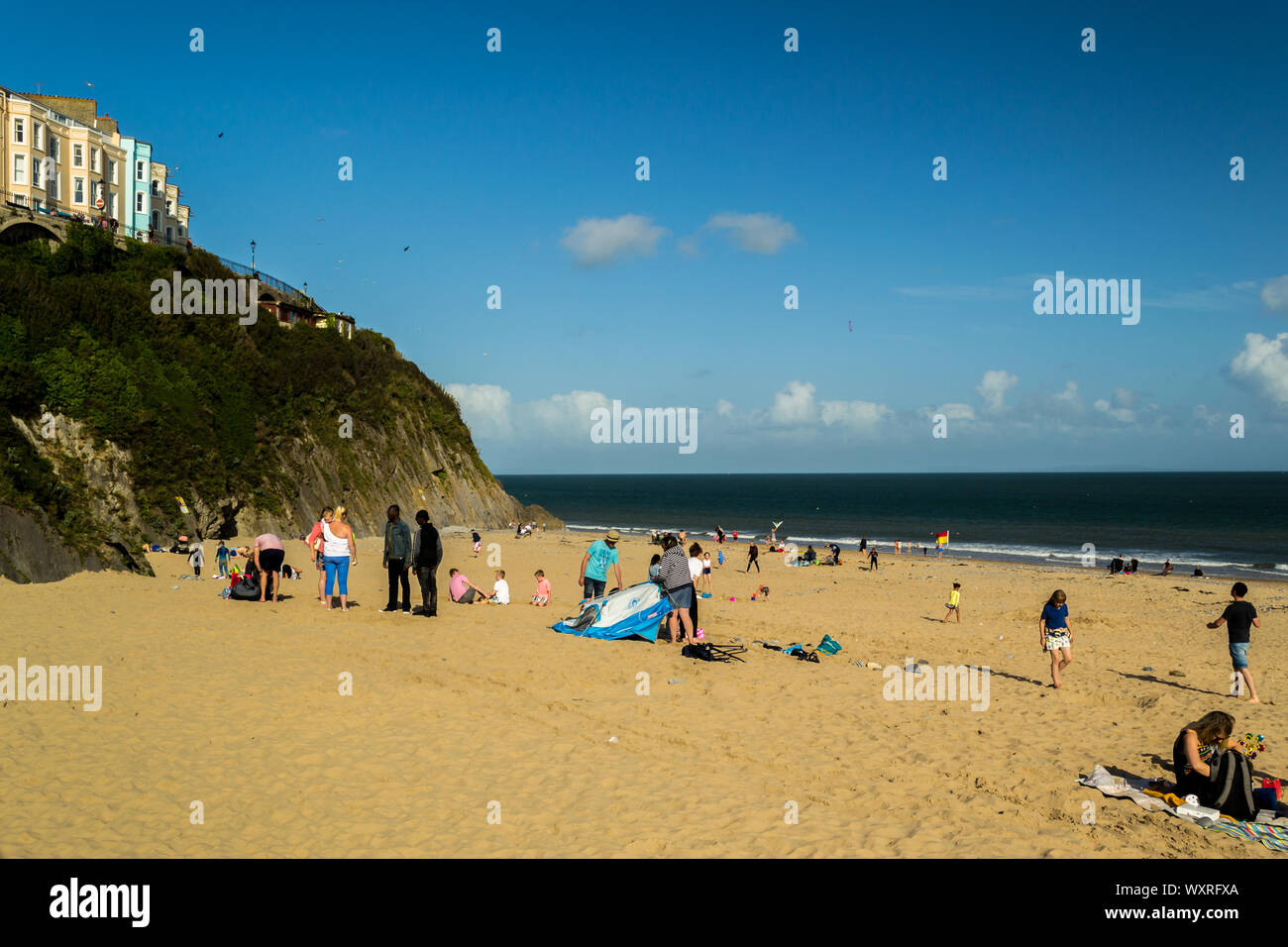 Coast with beach and monuments, Wales Stock Photo - Alamy