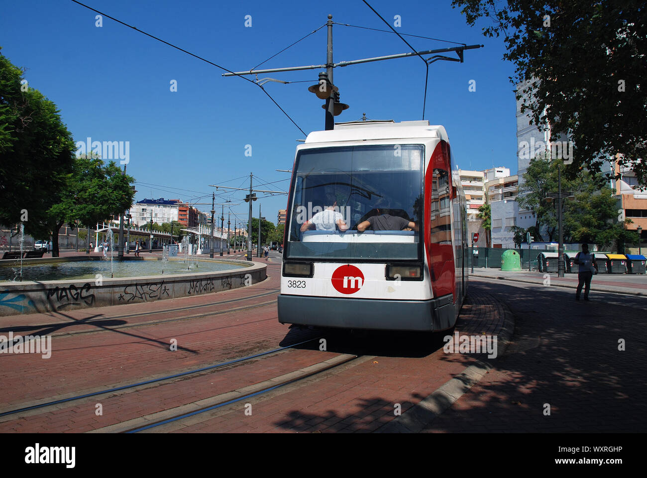 An electric tram turns round the loop at Pont de Fusta in Valencia ...