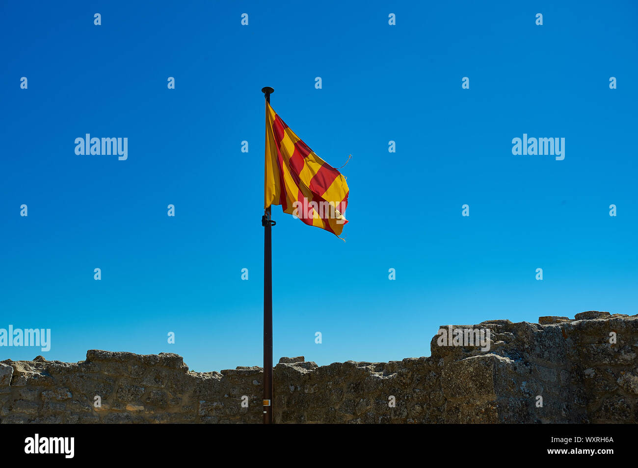 Flag of Provence on a pole Stock Photo - Alamy
