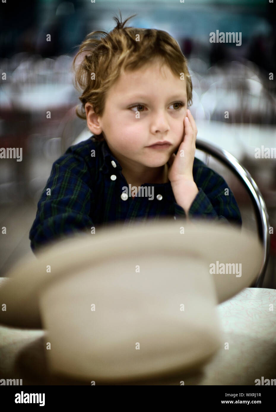Seated Boy Clothed High Resolution Stock Photography and Images - Alamy