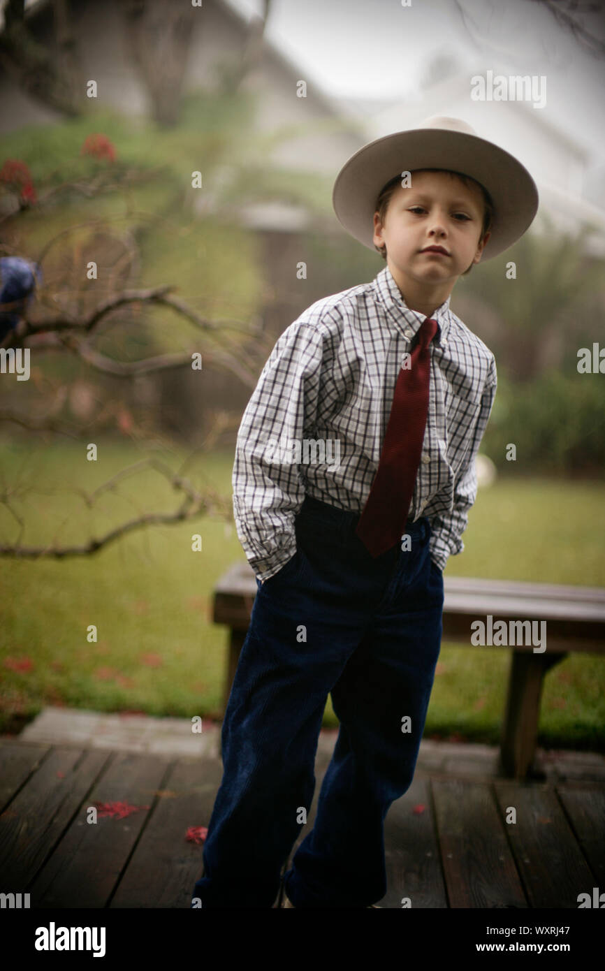 Boy with hands in pockets Stock Photo - Alamy