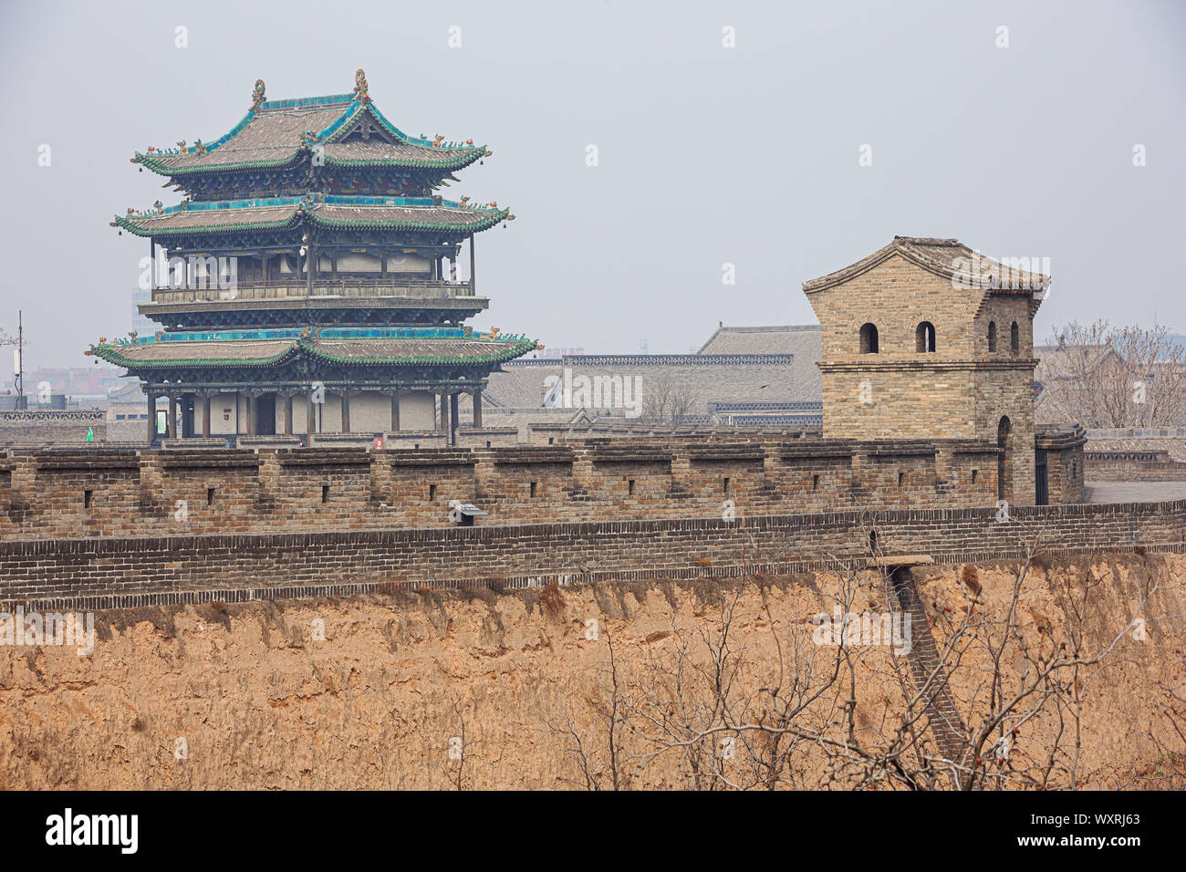 A part of the city wall and a watch tower in Pingyao seen from the city ...