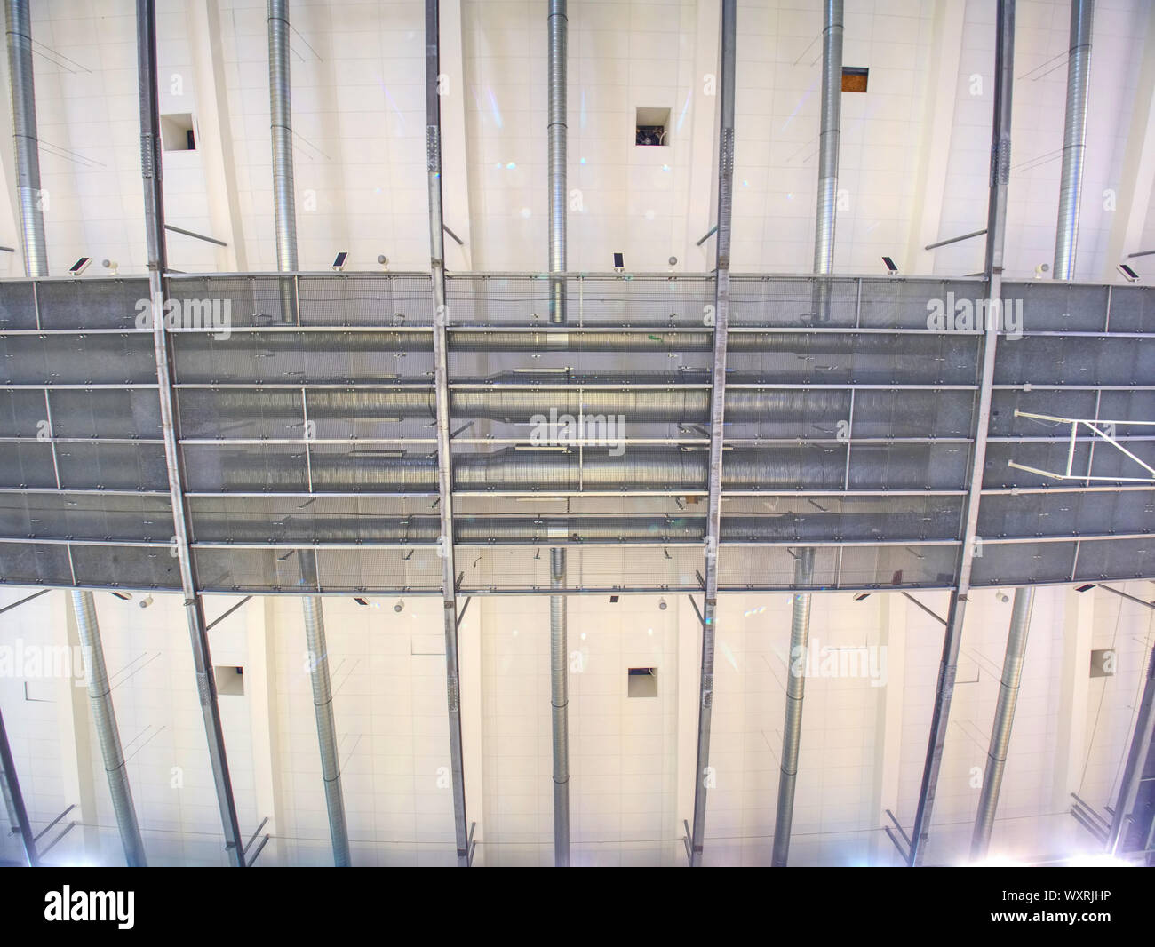 Air duct, wiring and plumbing in the mall. Air conditioner pipe, wiring ...