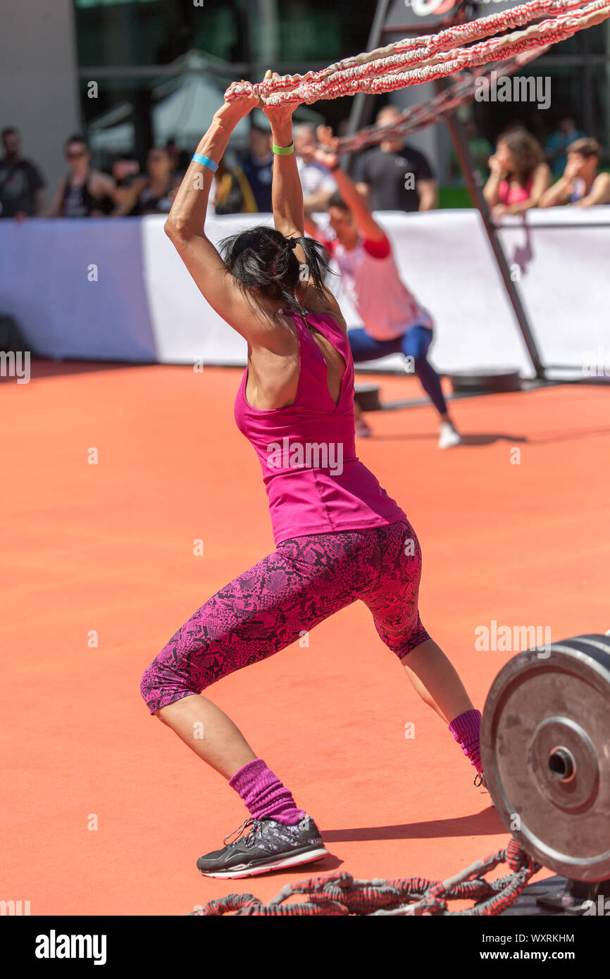 Girl Having Fitness Workout with Rope in an Outdoor Gym Stock Photo - Alamy