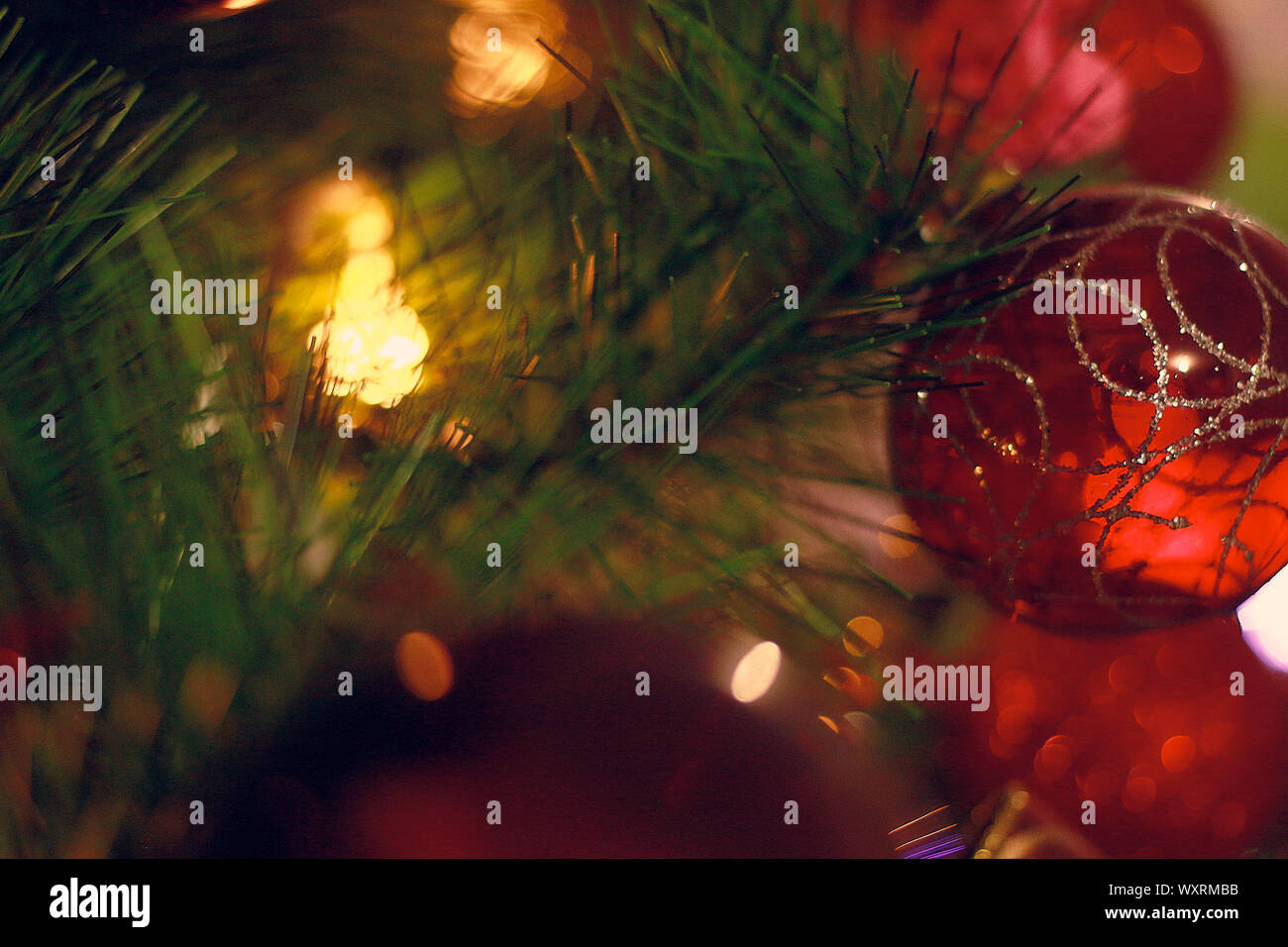 Christmas spheres and lights in dark tones Stock Photo - Alamy