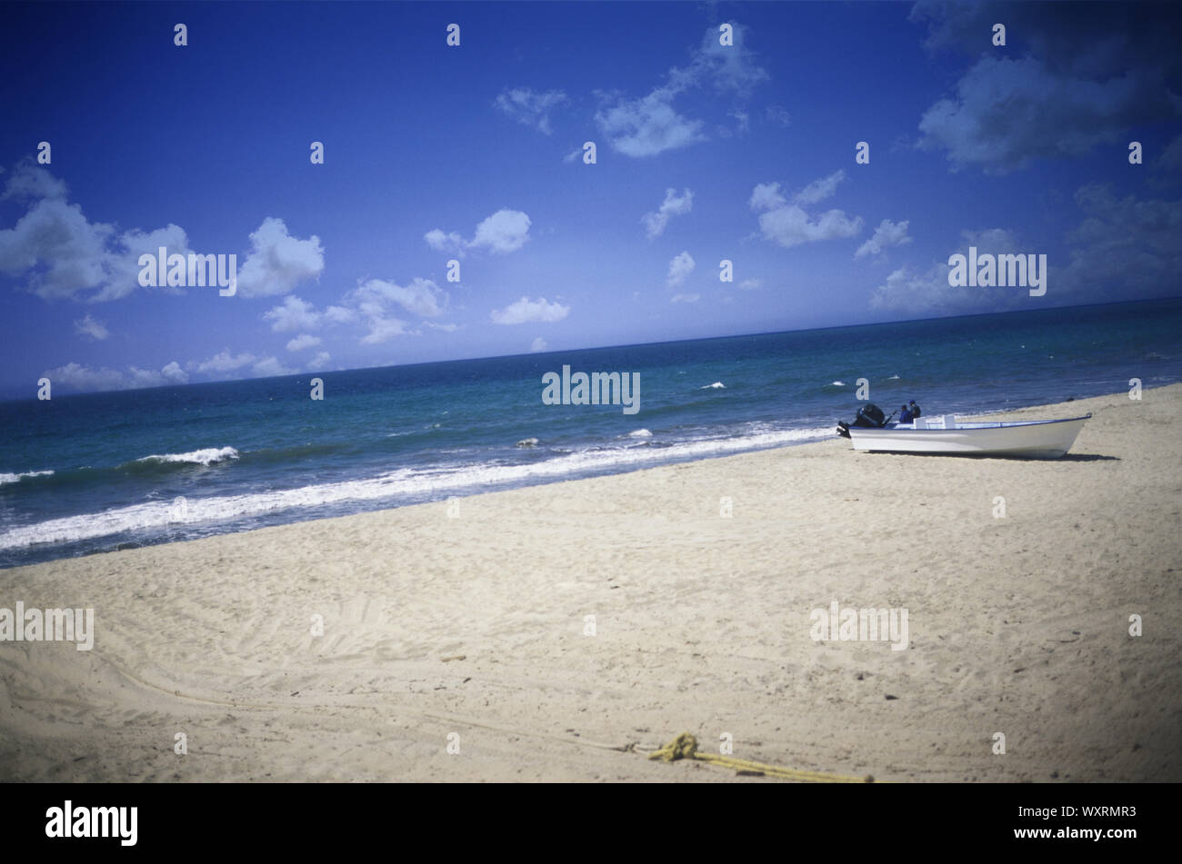 Beautiful beach with boat Stock Photo - Alamy