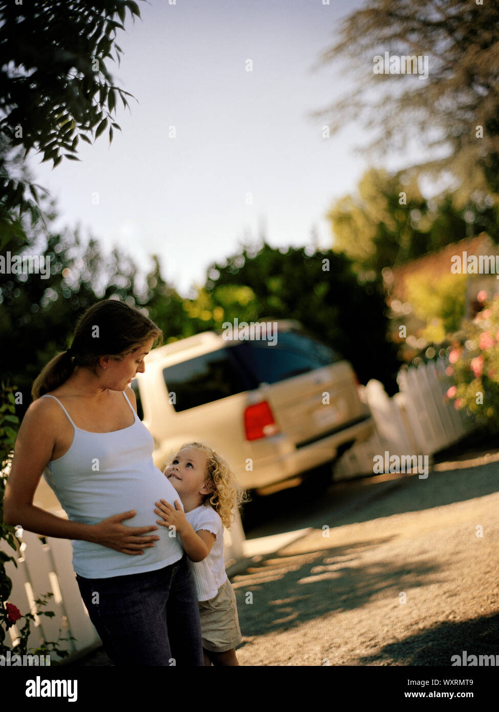 mother and daughter in driveway Stock Photo - Alamy