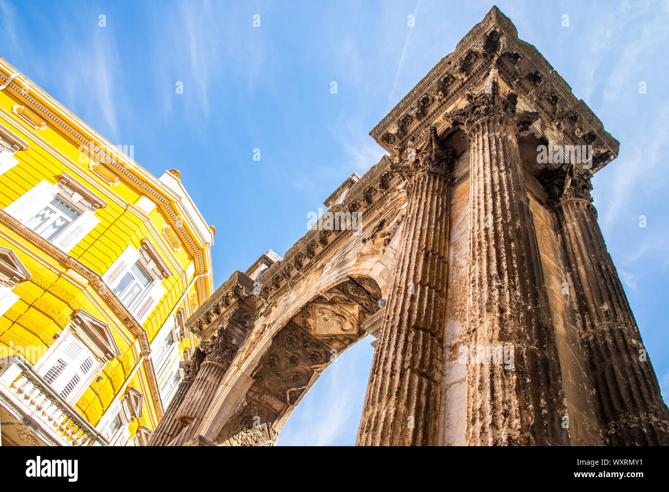 Architecture of Istria- Roman Sergius Arch in Pula against the ...