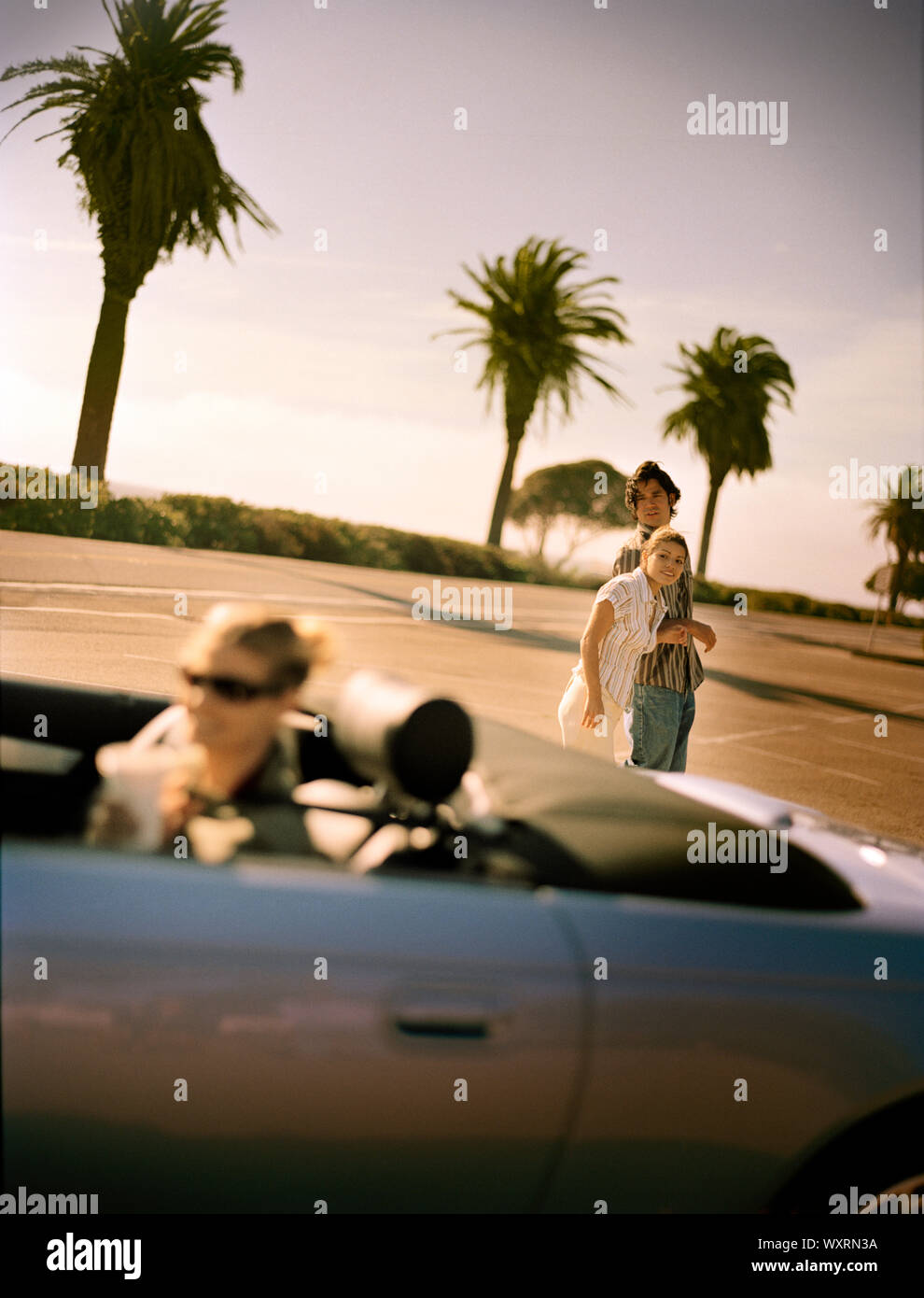 lady driving off in car Stock Photo - Alamy