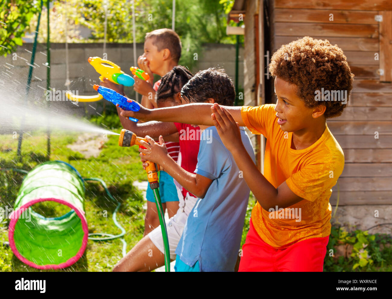 Water pistol fight hi-res stock photography and images - Alamy